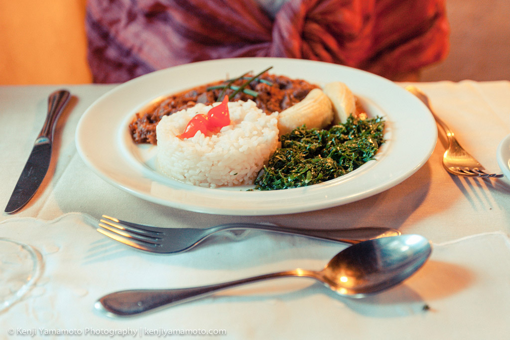 Spice meat with rice and banana at Quinta Restaurant. Photo: Kenji ...